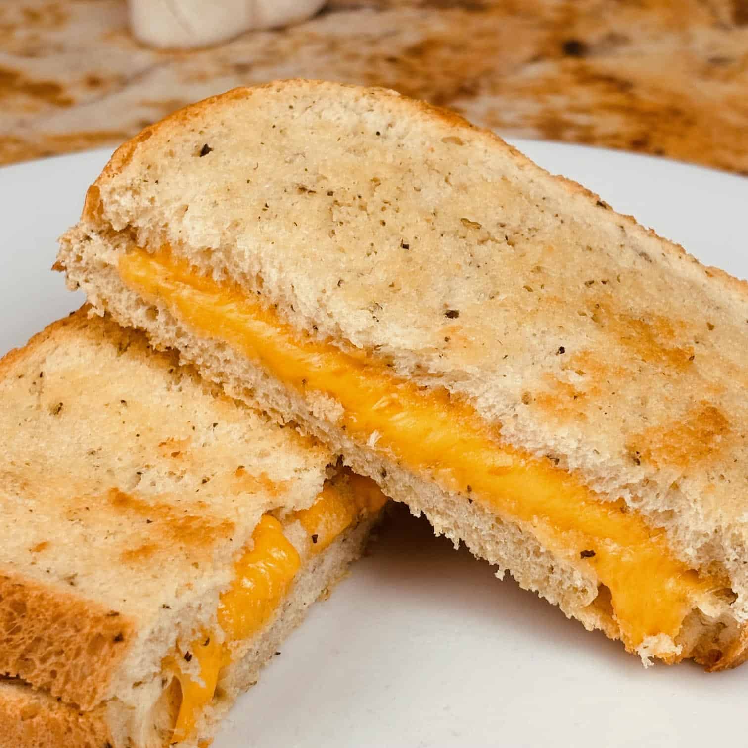 Oven Baked Grilled Cheese - Easy, Crispy & Cheesy - Bread Dad